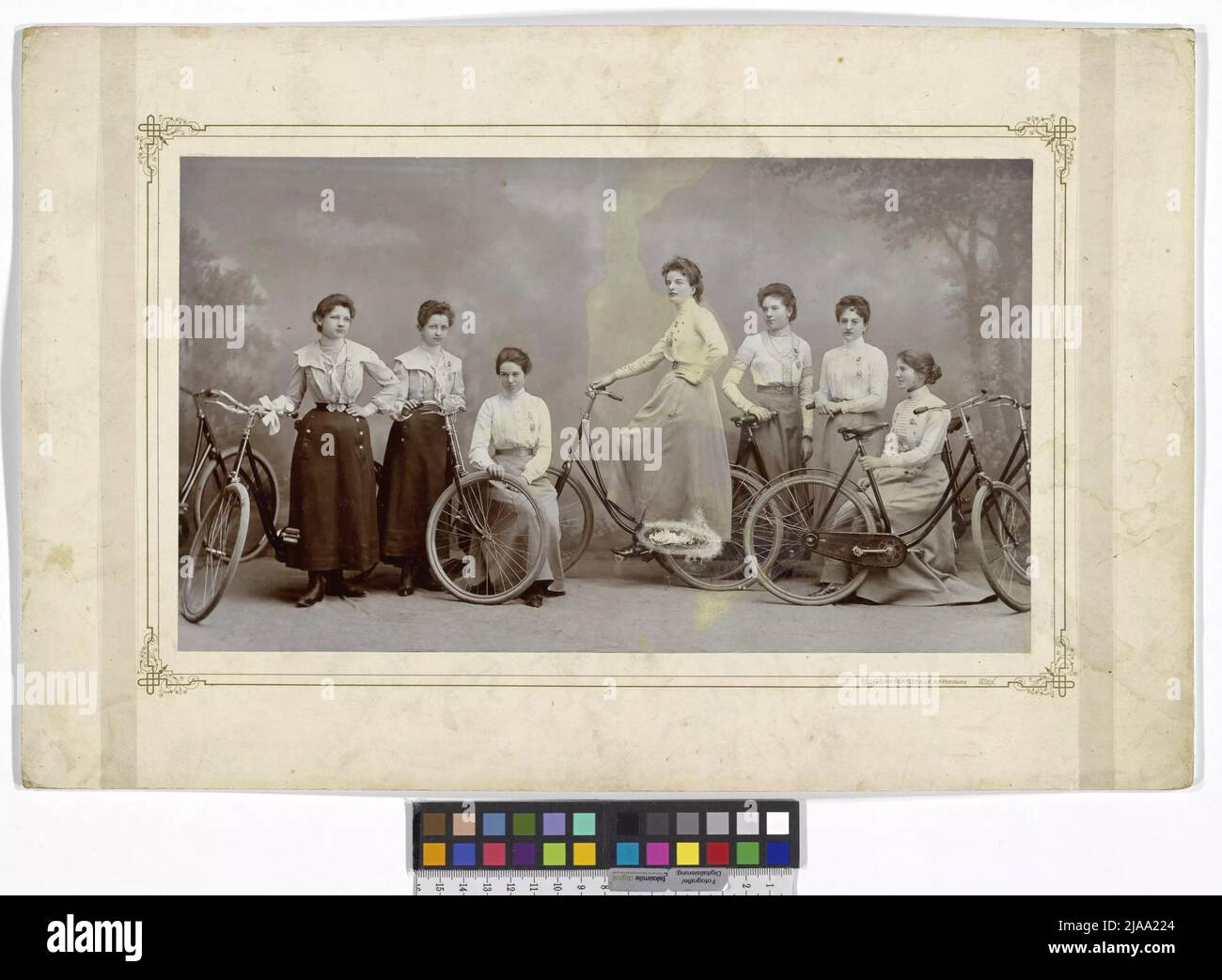 Group portrait of cyclists (presumably members of a bicycle club). Rosa ...