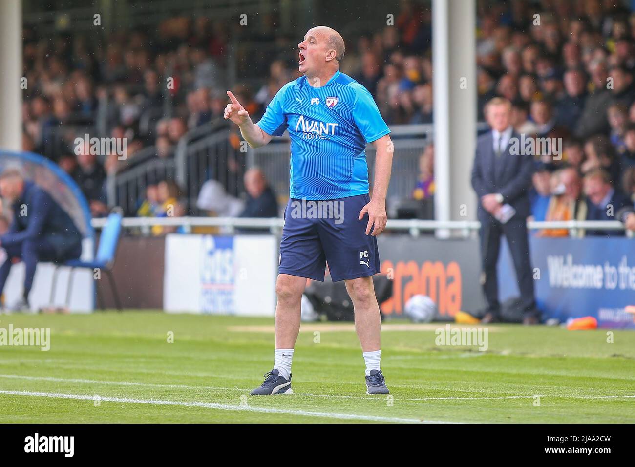 Paul Cook manager of Chesterfield gives his team instructions Stock ...