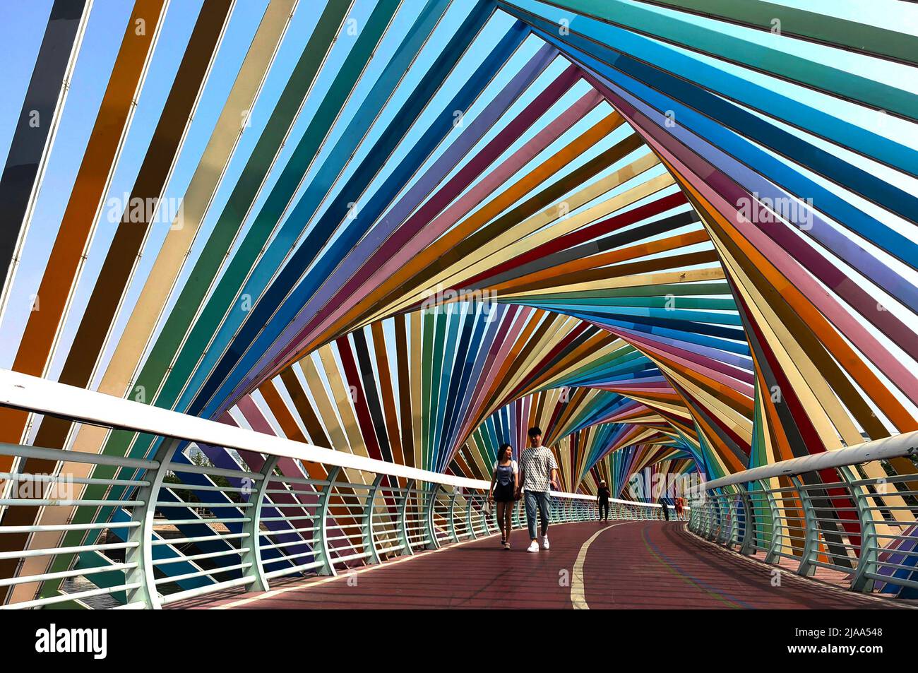 QINGDAO, CHINA - MAY 29, 2022 - People play in the "Rainbow Bridge" in ...
