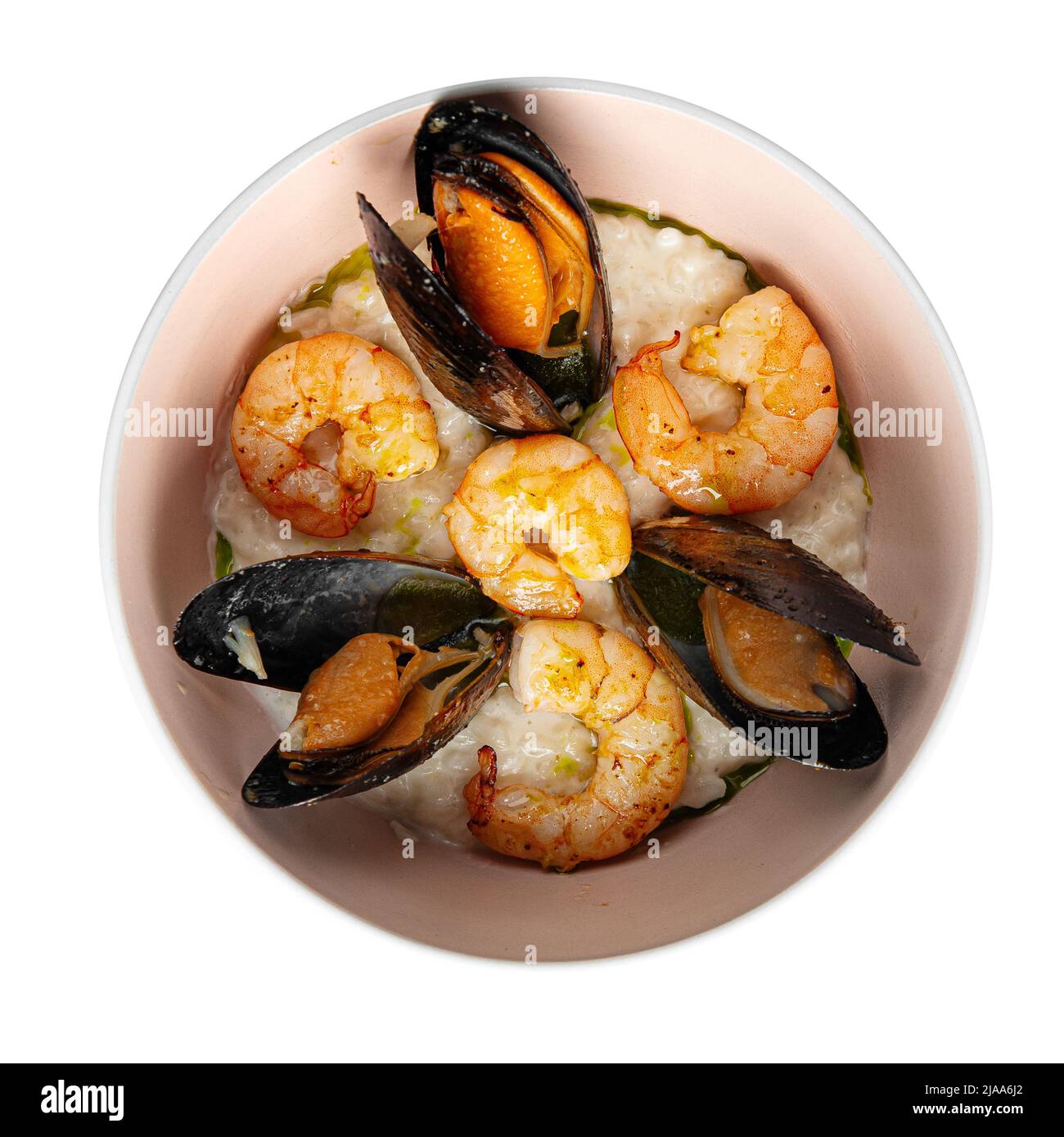 Isolated portion of seafood risotto Stock Photo - Alamy