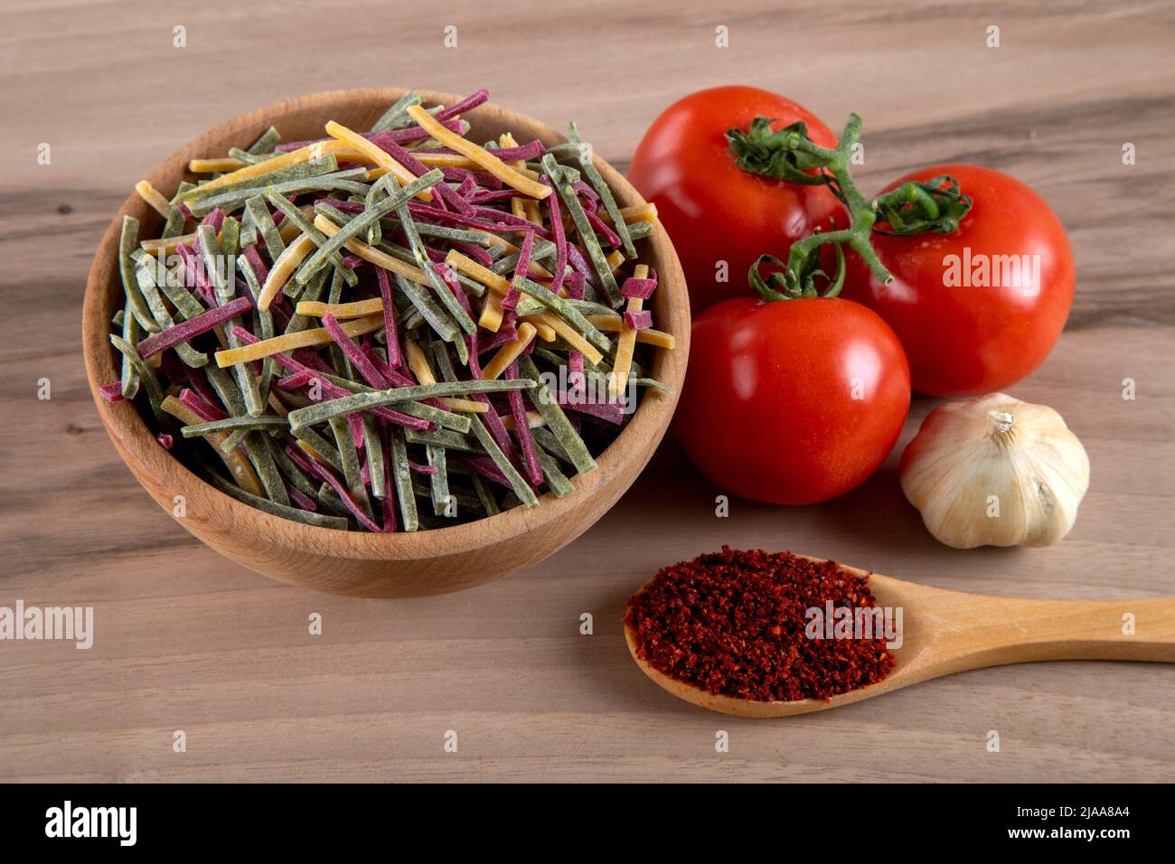 Traditional Turkish colors noodles with tomatoes, eggs and spices Stock ...