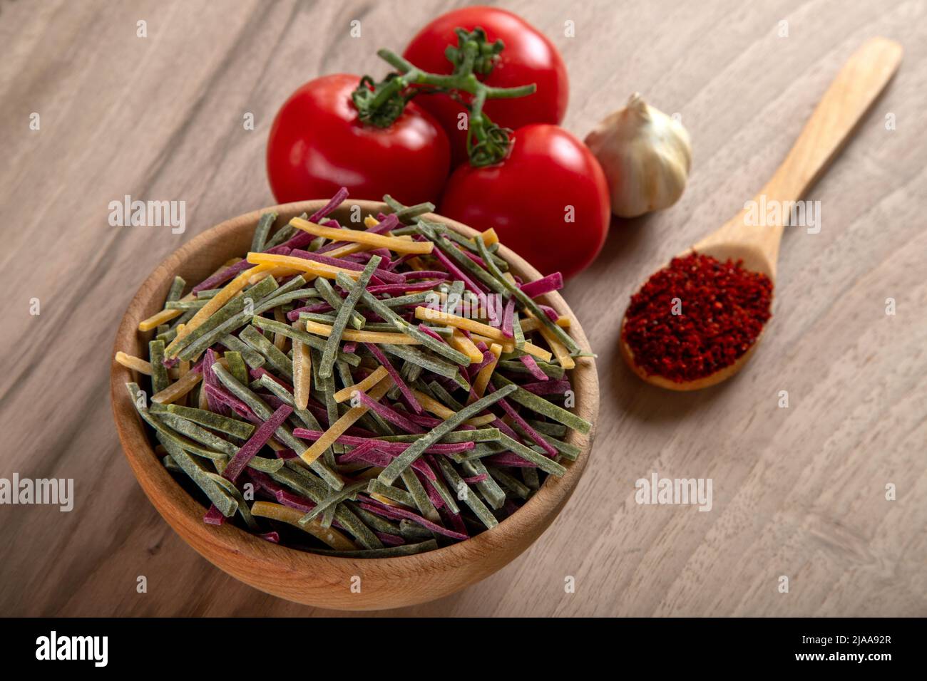 Traditional Turkish colors noodles with tomatoes, eggs and spices Stock ...