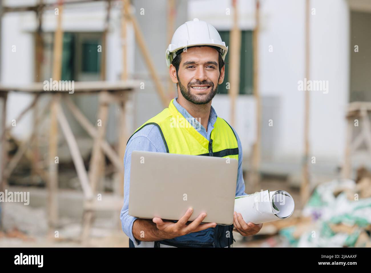 Engineer builder. Happy Foreman work in construction site. senior ...