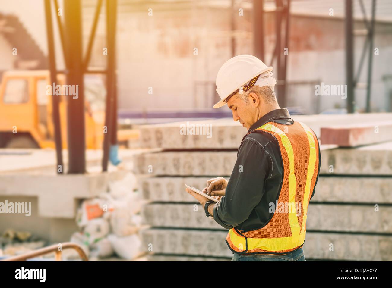 Professional Caucasian Engineer male builder working at construction ...