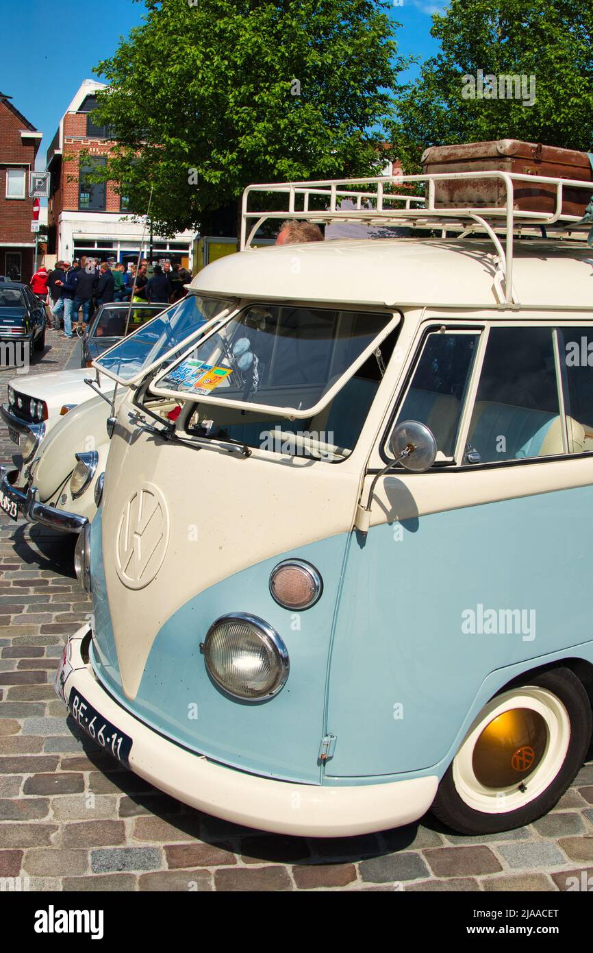 Front of a vintage Volkswagen panel van with upward opening windshields ...