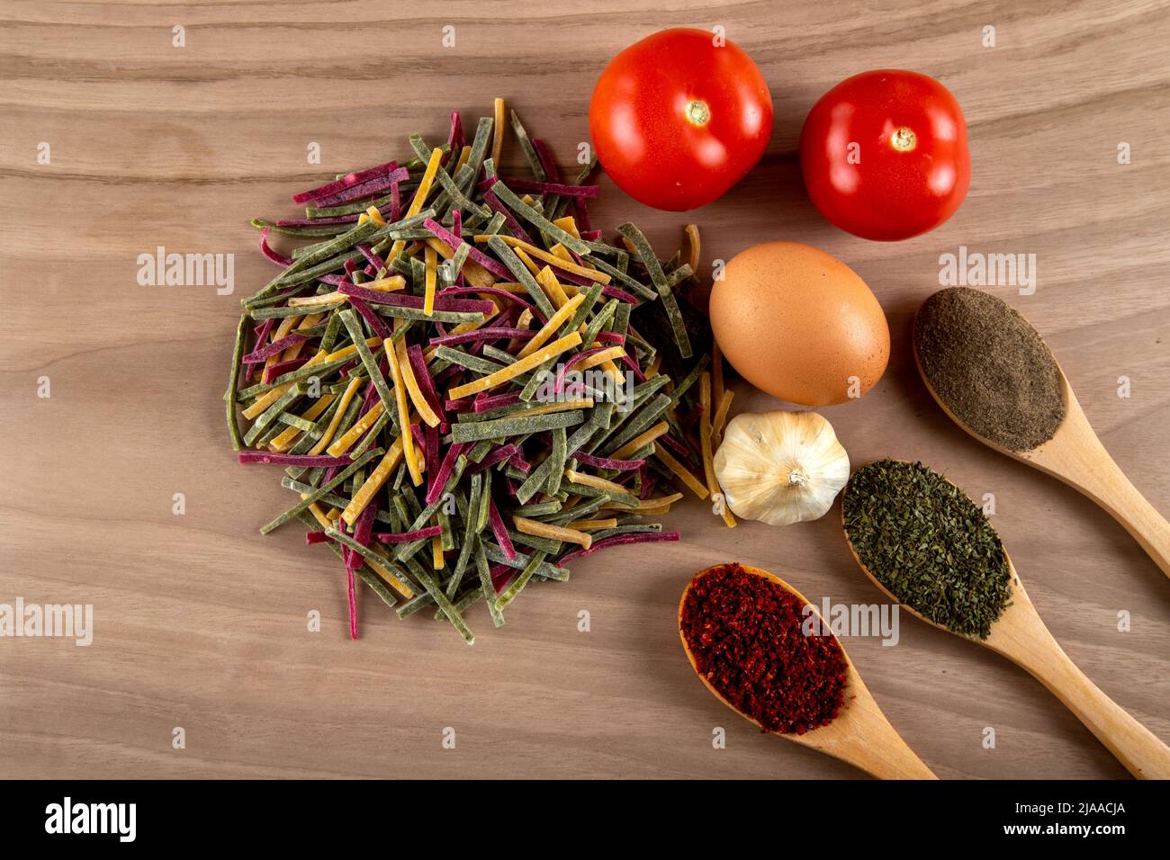 Traditional Turkish colors noodles with tomatoes, eggs and spices Stock ...