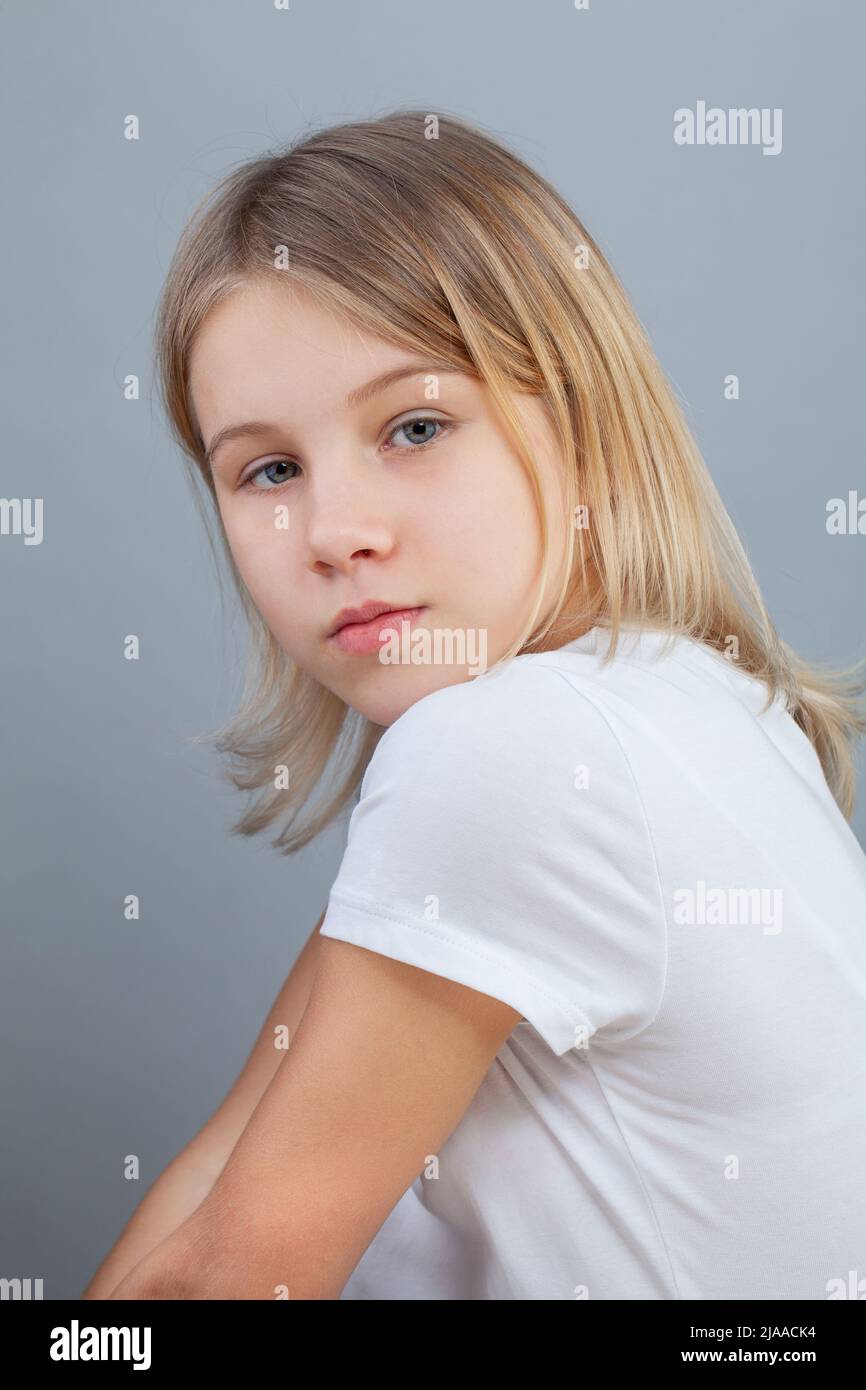Blonde child girl studio portrait Stock Photo - Alamy