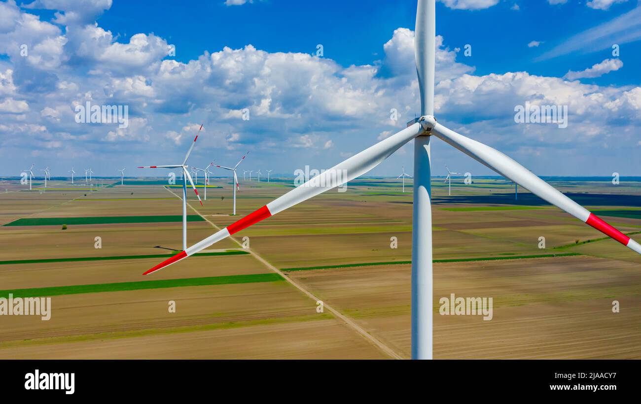 Close-up in aerial view at large propeller of windmill, wind generator ...