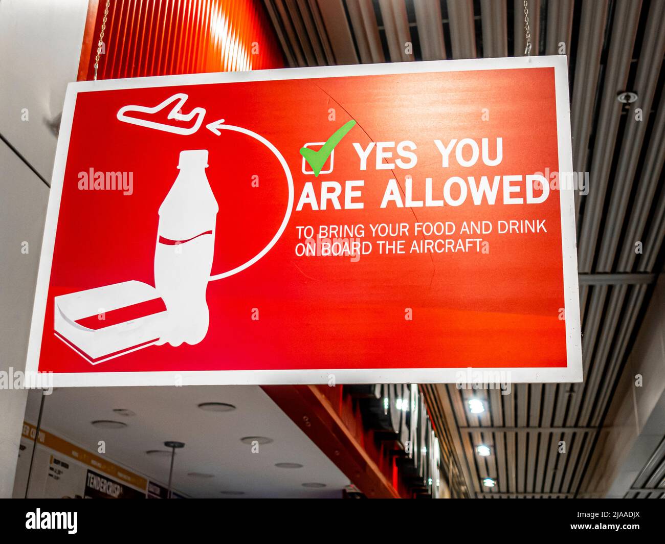 Yes You Are Alllowed to take food on a plane sign in the terminal of ...