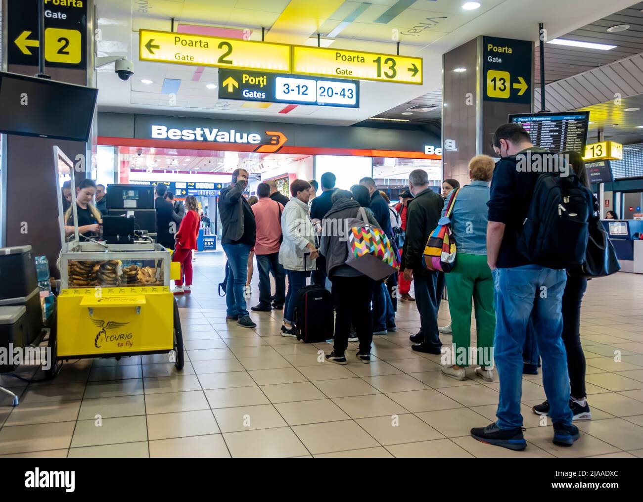 Passengers in queuee at the Gate 13 terminal of Henri Coandă ...