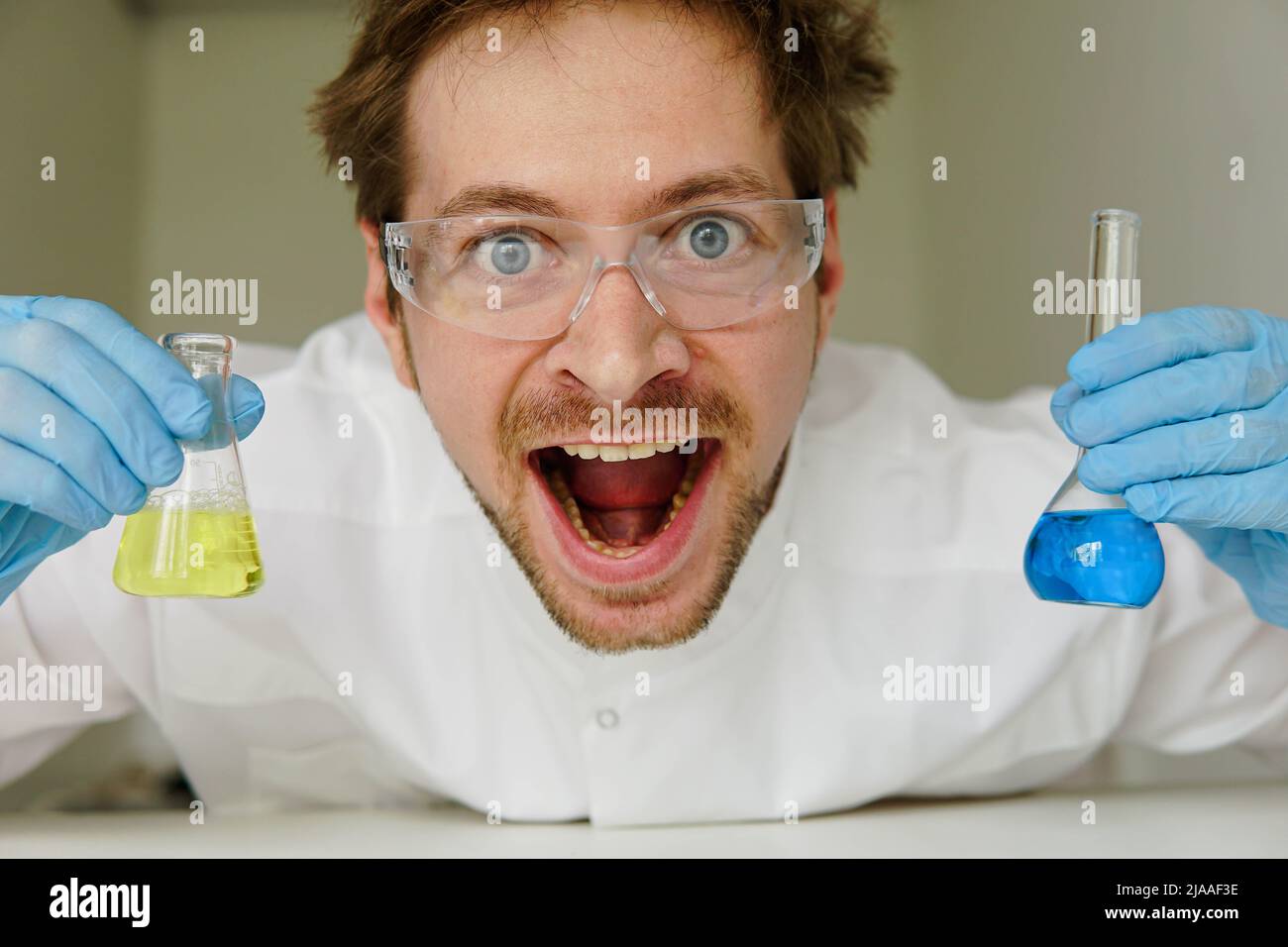 Crazy scientist in lab hi-res stock photography and images - Alamy