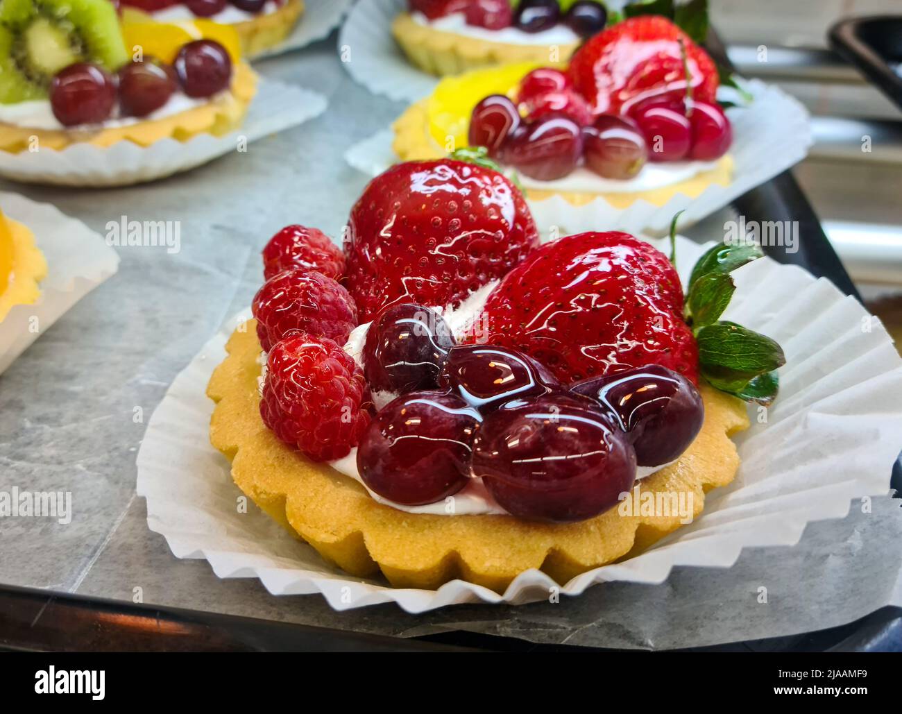 Assorted fruit pie, strawberry, pineapple, kiwi, mango, cherry Stock ...