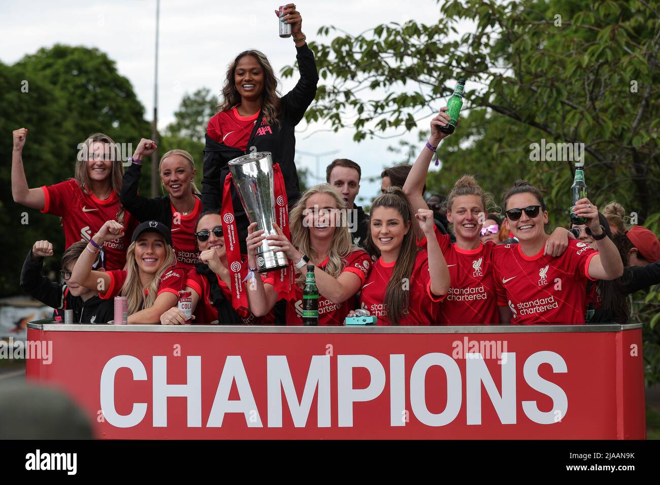 The Liverpool FC Women celebrate on the open top bus parade after ...