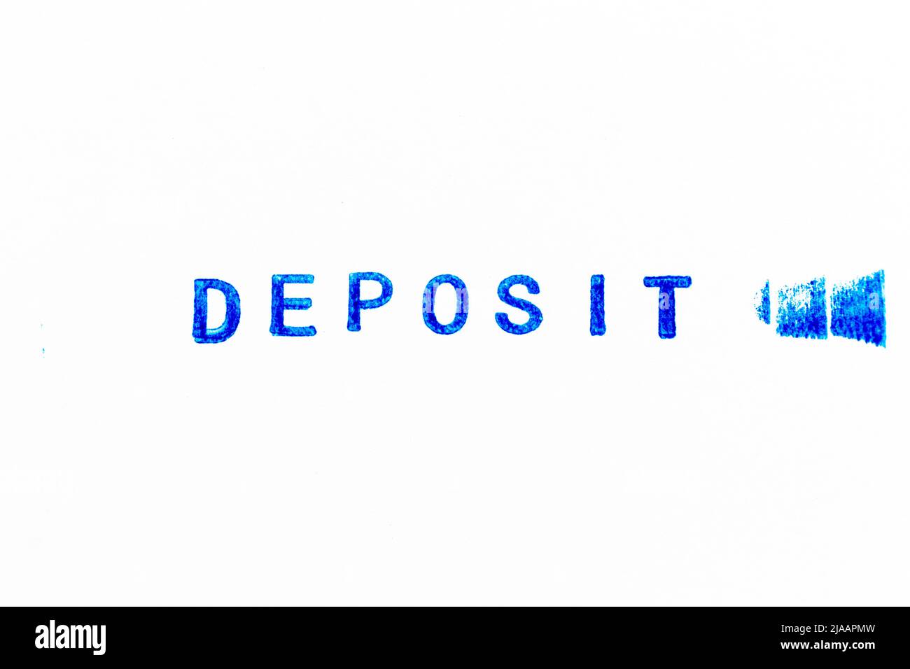 Blue color ink of rubber stamp in word deposit on white paper ...