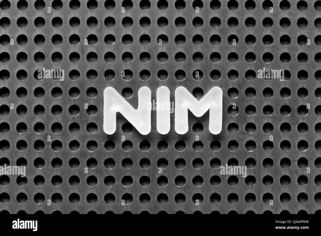 White alphabet letter in word NIM (Abbreviation of Net interest margin ...
