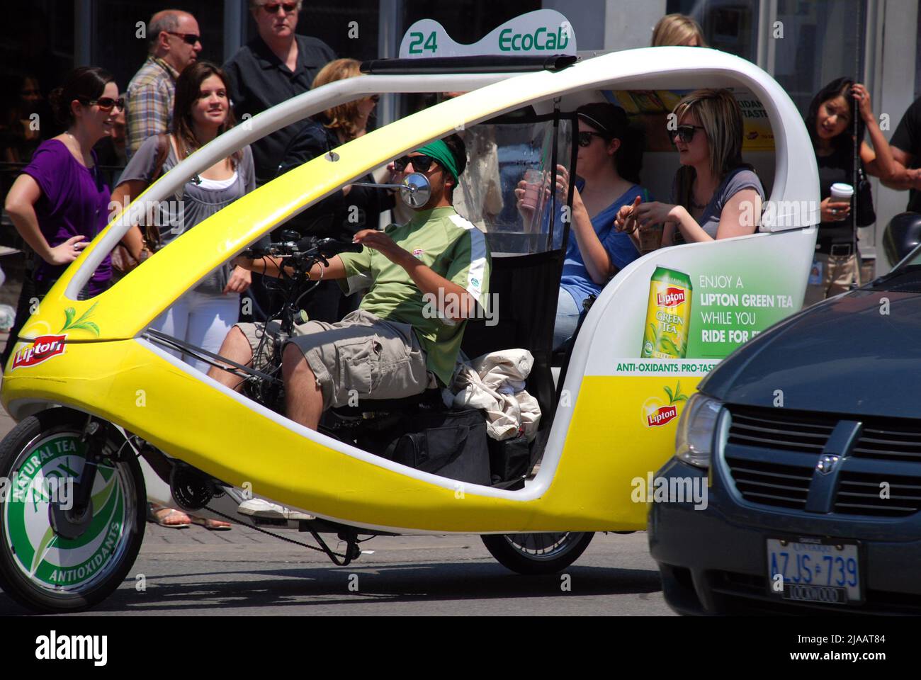 Toronto, Canada - June 25, 2008: An EcoCab powered by a trained driver ...