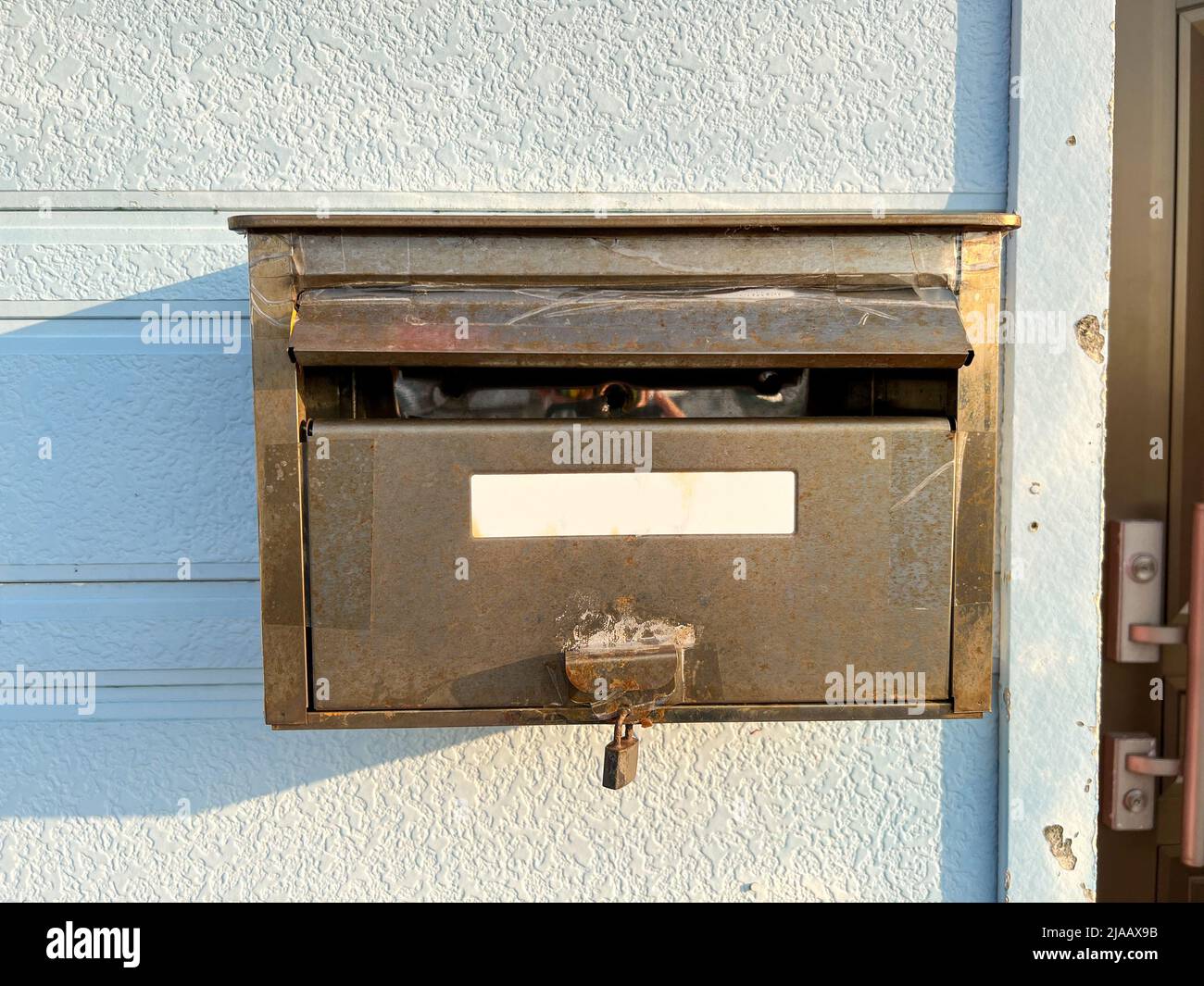 An old stainless steel mailbox Stock Photo - Alamy