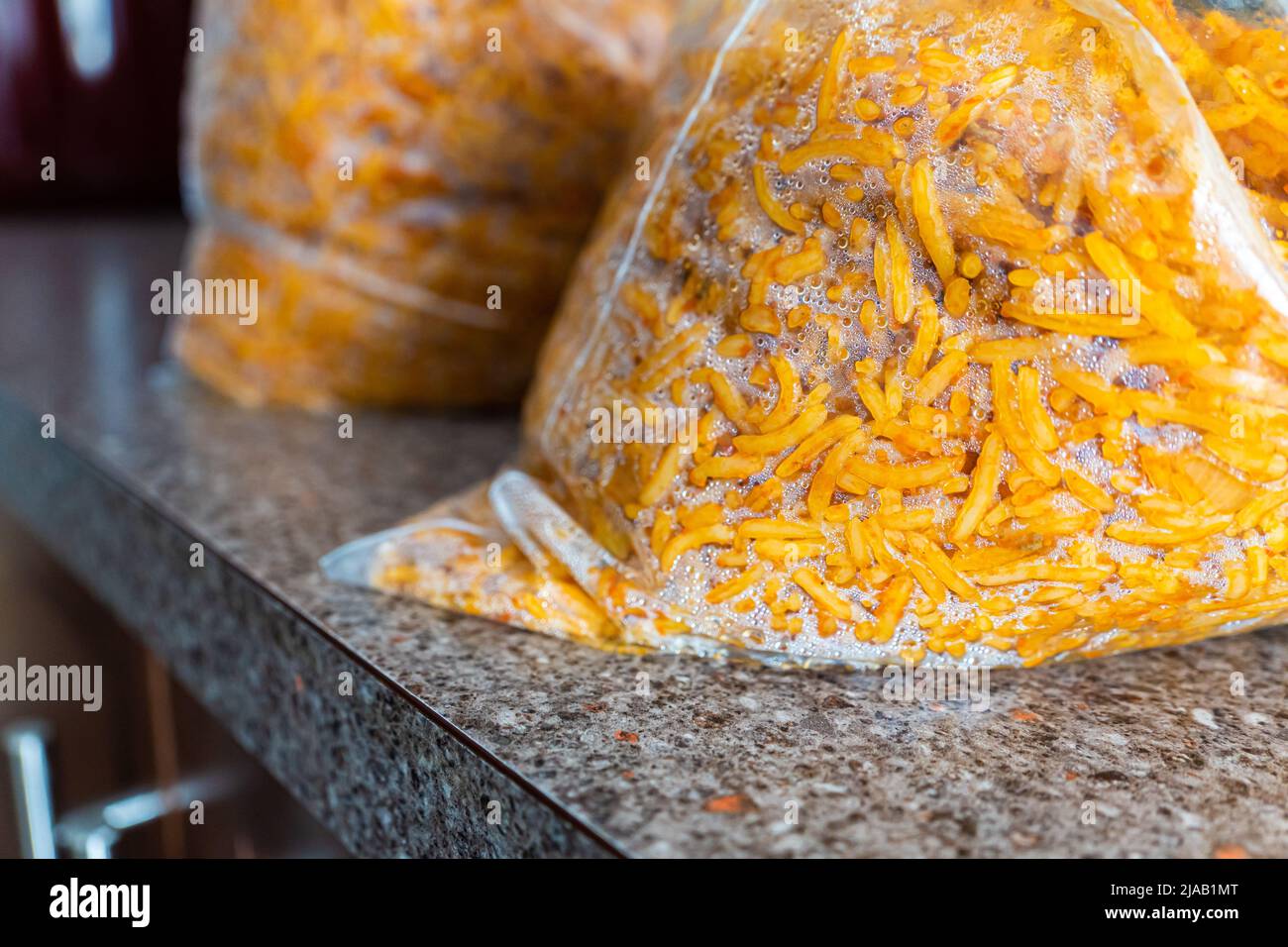 Rice in plastic bag hi-res stock photography and images - Alamy
