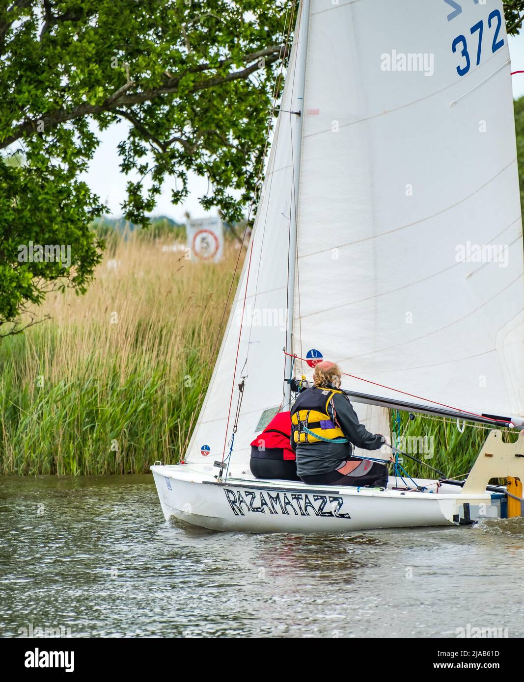 Horning, Norfolk, UK – May 28 2022. A small sailing boat on the River ...