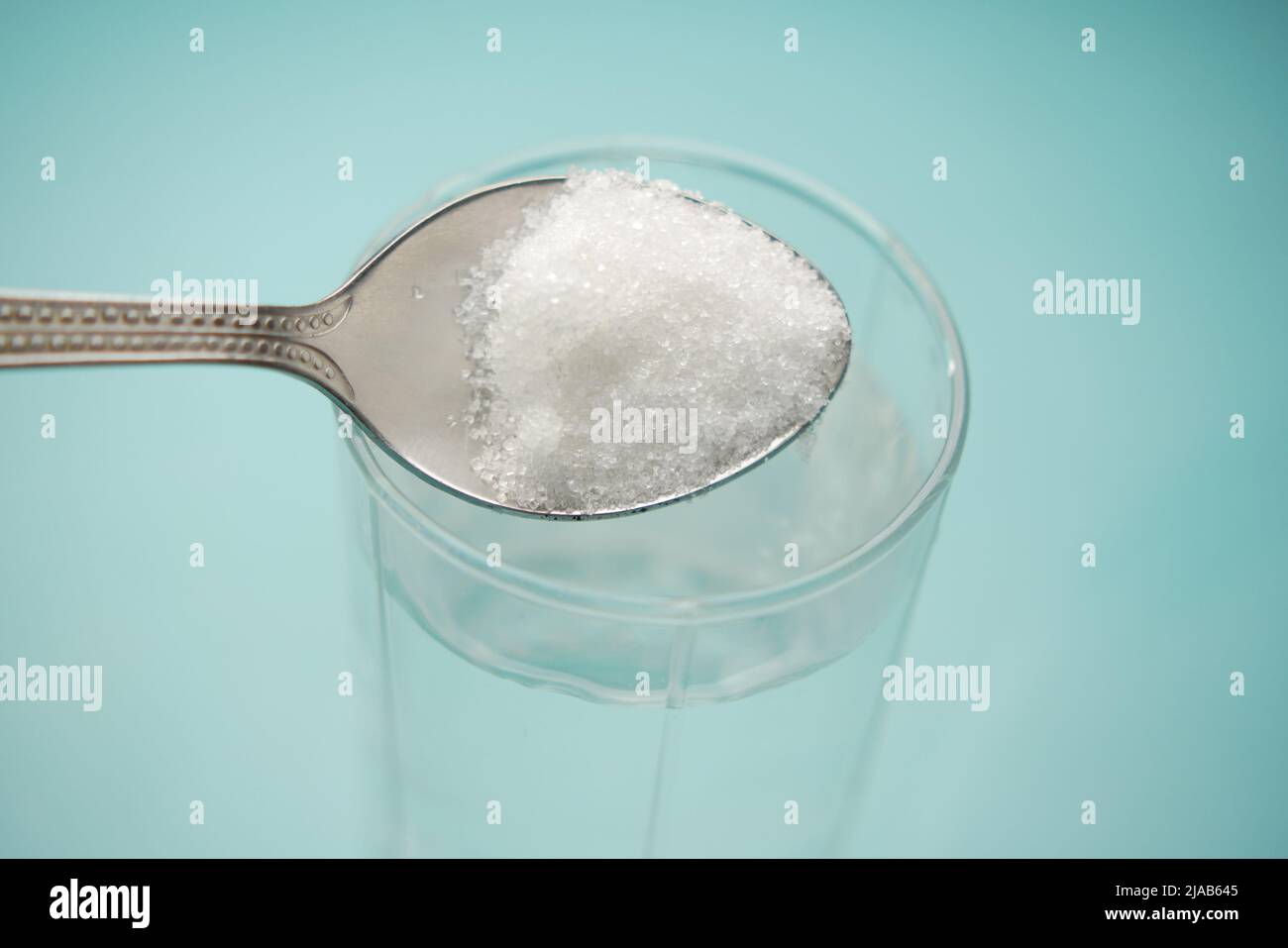 Sugar pouring in water hi-res stock photography and images - Alamy