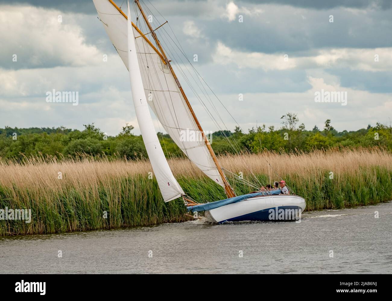 Horning, Norfolk, UK – May 28 2022. A traditional river cruiser sailing ...
