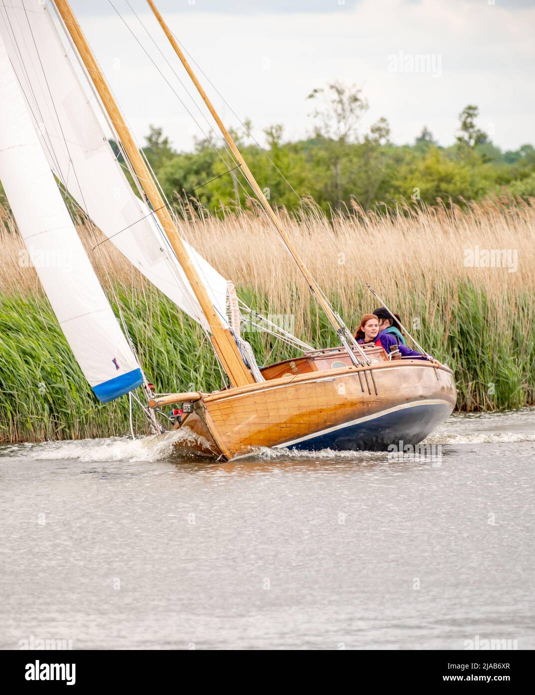 Horning, Norfolk, UK – May 28 2022. Traditional wooden river cruiser ...