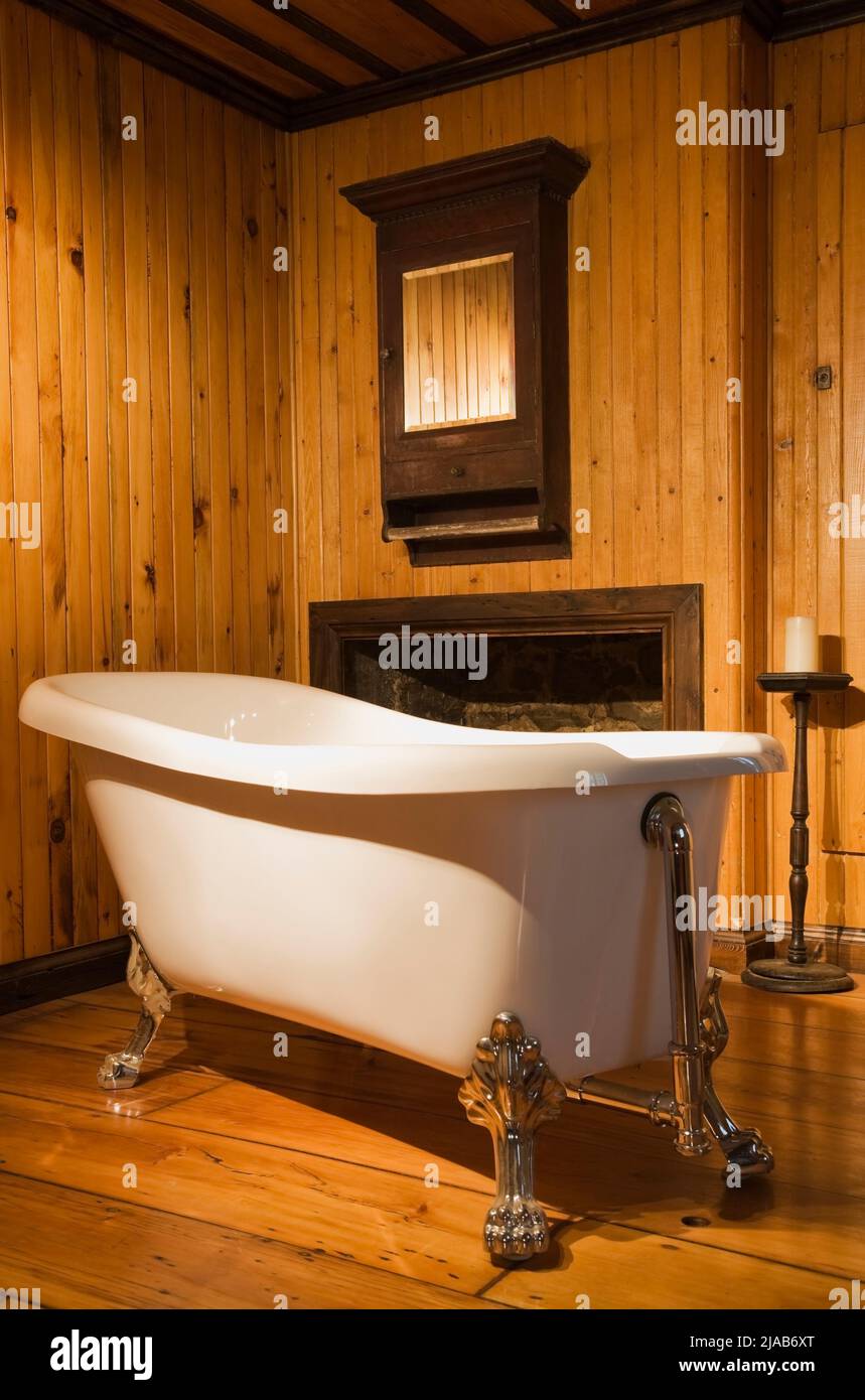 White freestanding roll top bathtub in bathroom inside old 1826 ...