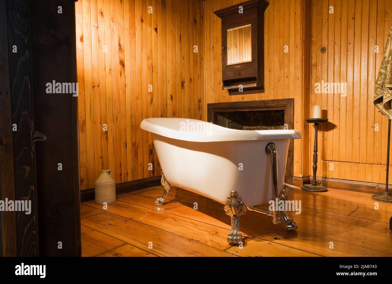 White freestanding roll top bathtub in bathroom inside old 1826 ...