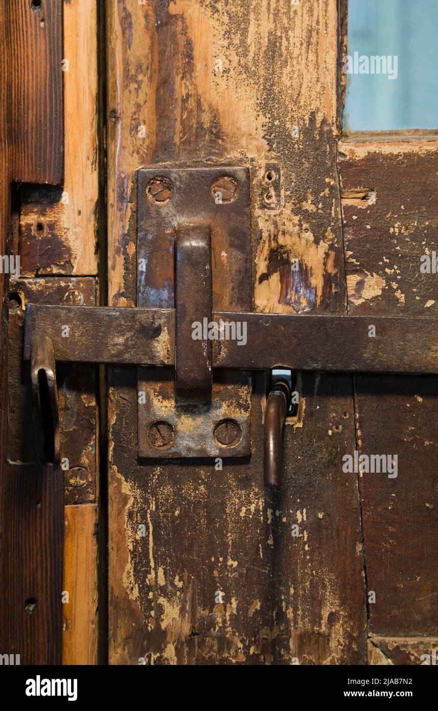 Close-up of old latch set on wooden door inside old 1826 Canadiana ...