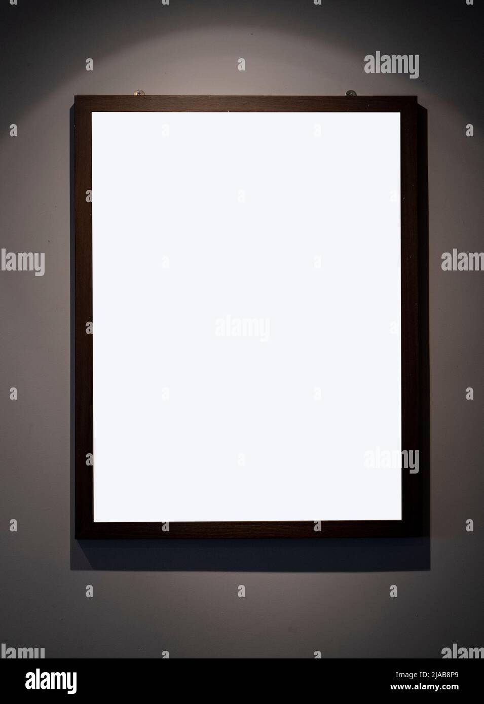 wooden frame with a white screen and grey wall Stock Photo - Alamy
