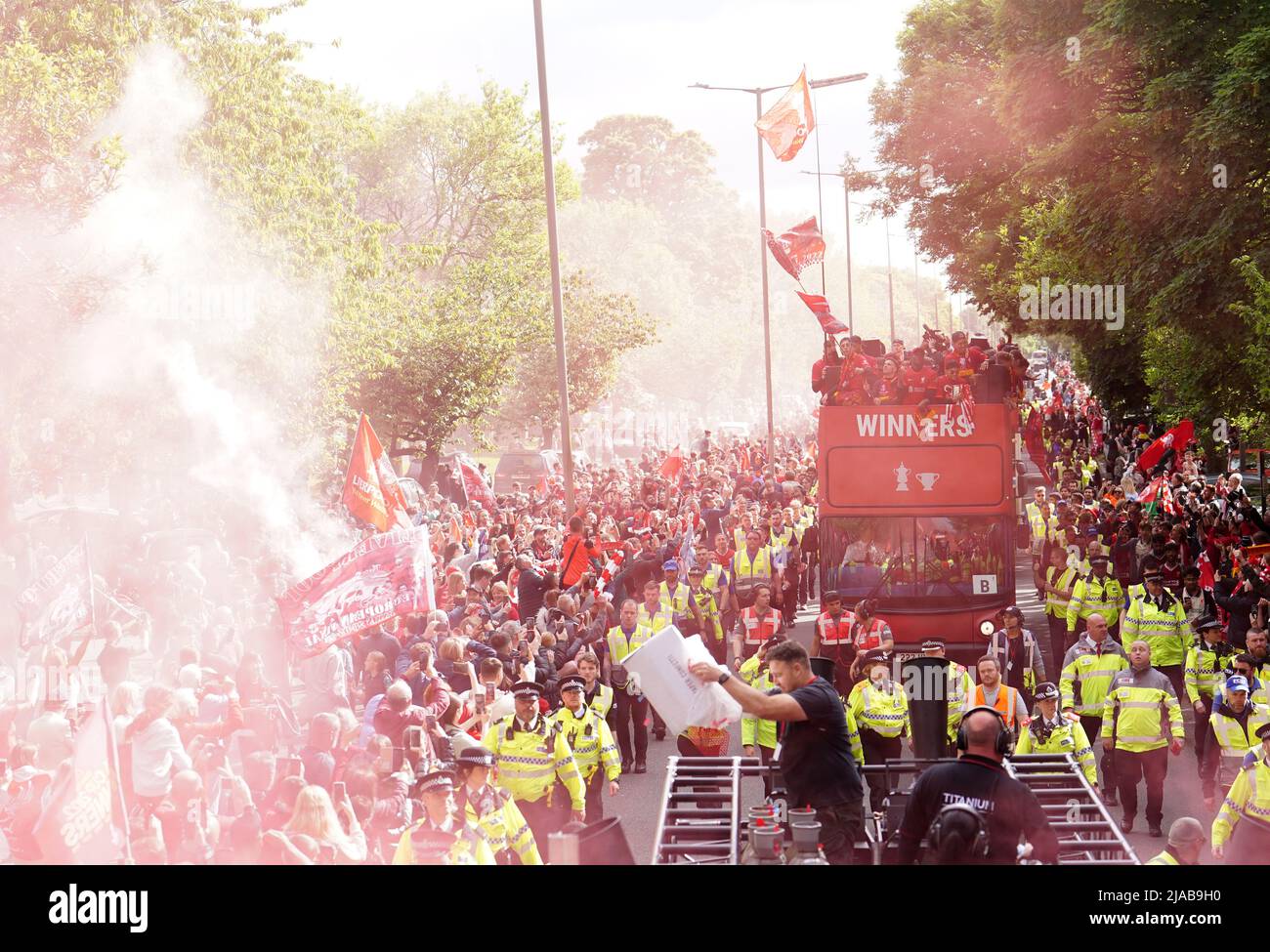 Liverpool players on an open-top bus during the trophy parade in ...