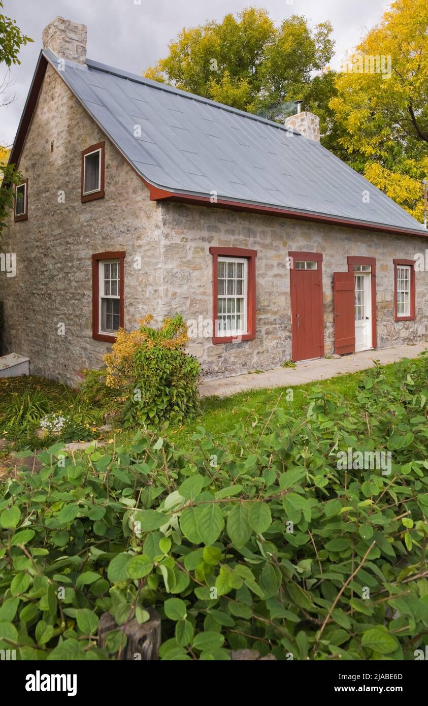Old circa 1840 French regime cottage style fieldstone home with grey ...