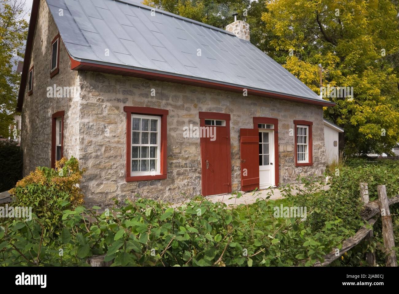 Old circa 1840 French regime cottage style fieldstone home with grey ...