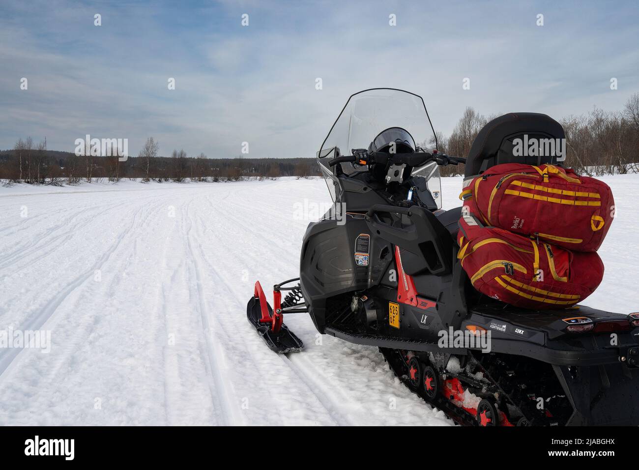 Rovaniemi, Finland - March 20th, 2022: A loaded snowmobile ready to ...
