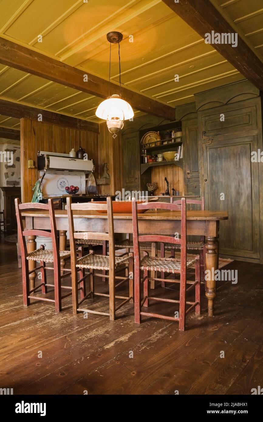 Antique wooden dining table and chairs in kitchen inside old circa 1840 ...