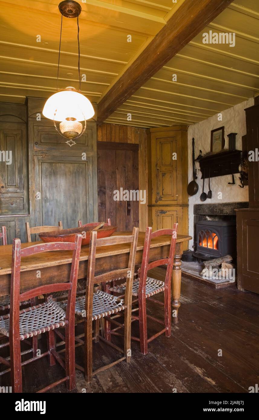 Antique wooden dining table and chairs in kitchen inside old circa 1840 ...