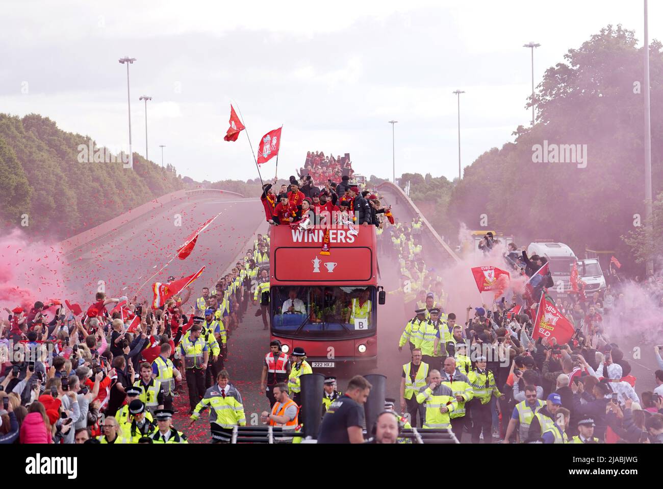 Liverpool players on an open-top bus during the trophy parade in ...
