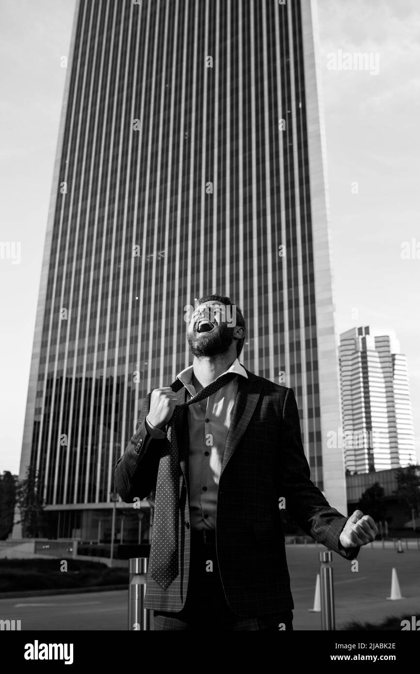 Angry businessman in suit after work in office. Screaming face Stock ...