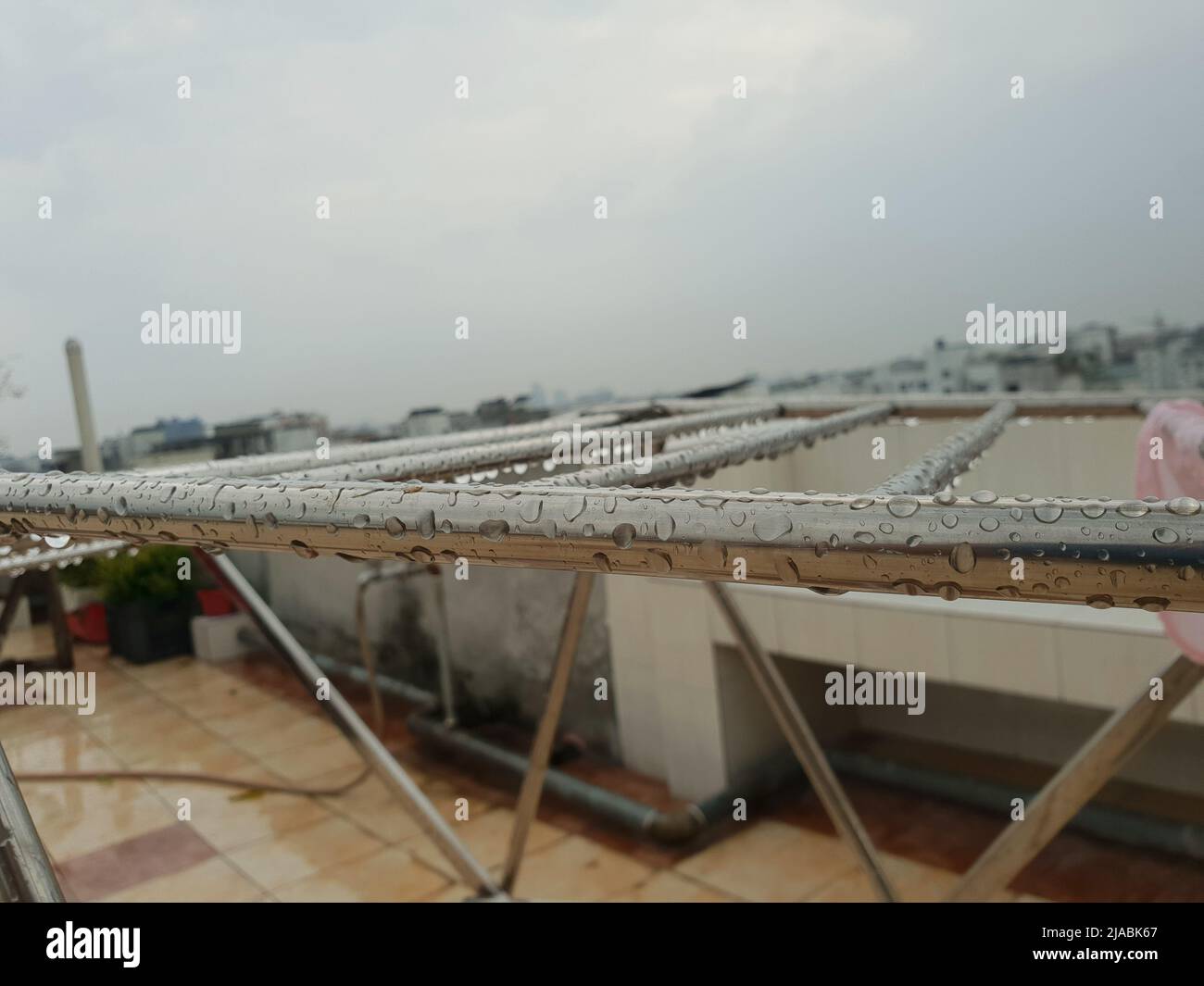 Stainless steel for drying cloth on the roof Stock Photo - Alamy