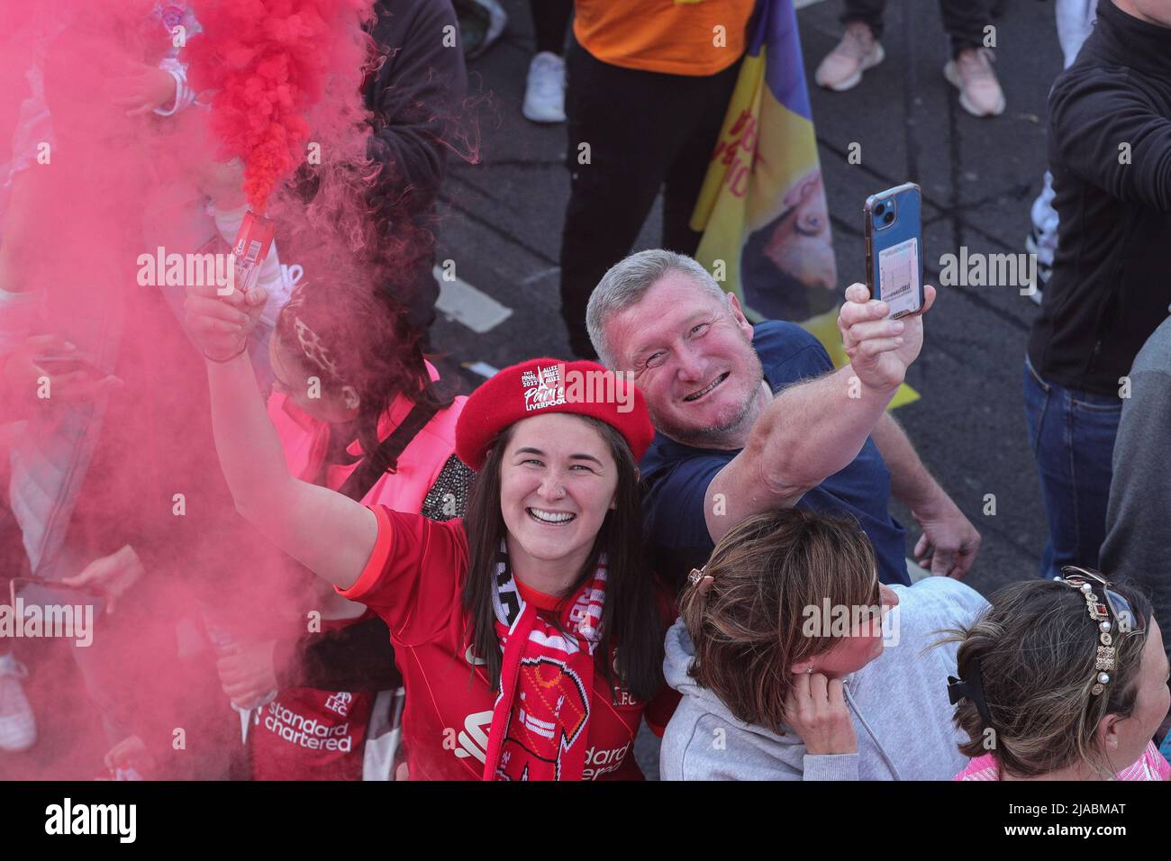 Supporters cheer on the Liverpool FC squad as they celebrate during the ...