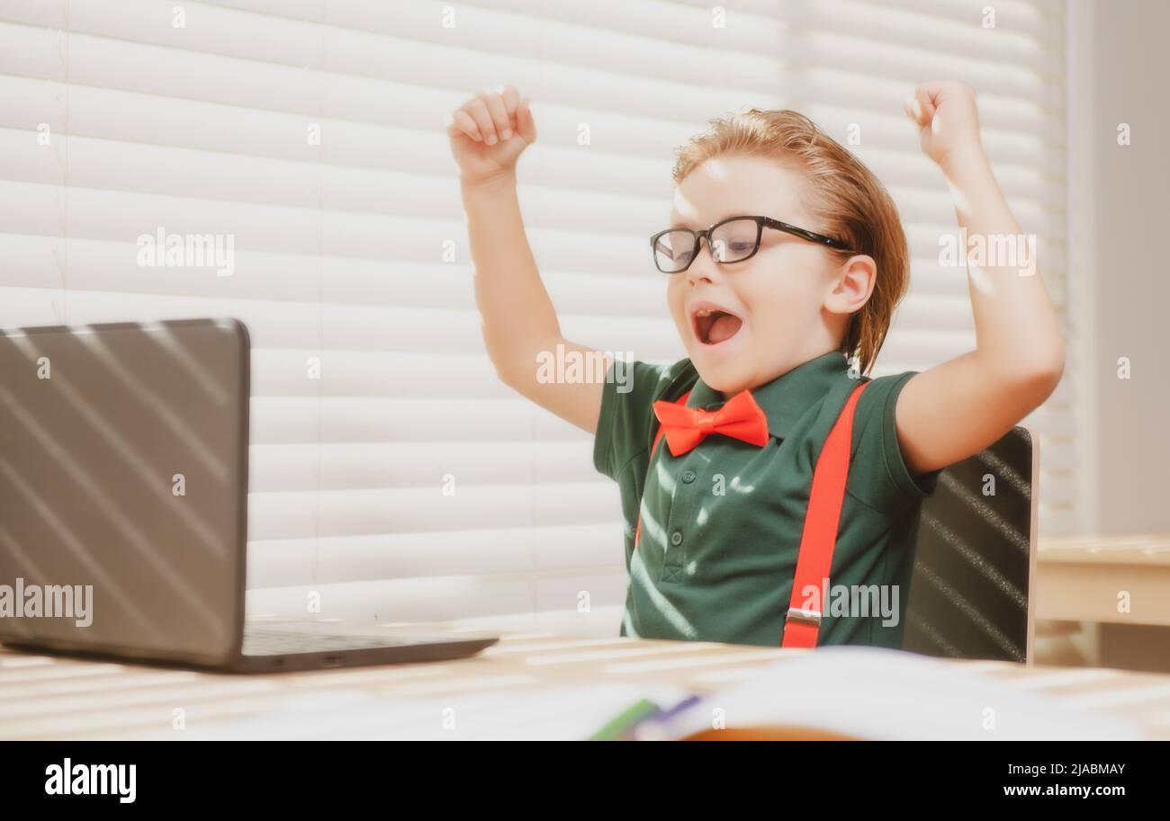 Back to school and home schooling. Happy school kid at lesson. Pupil in ...
