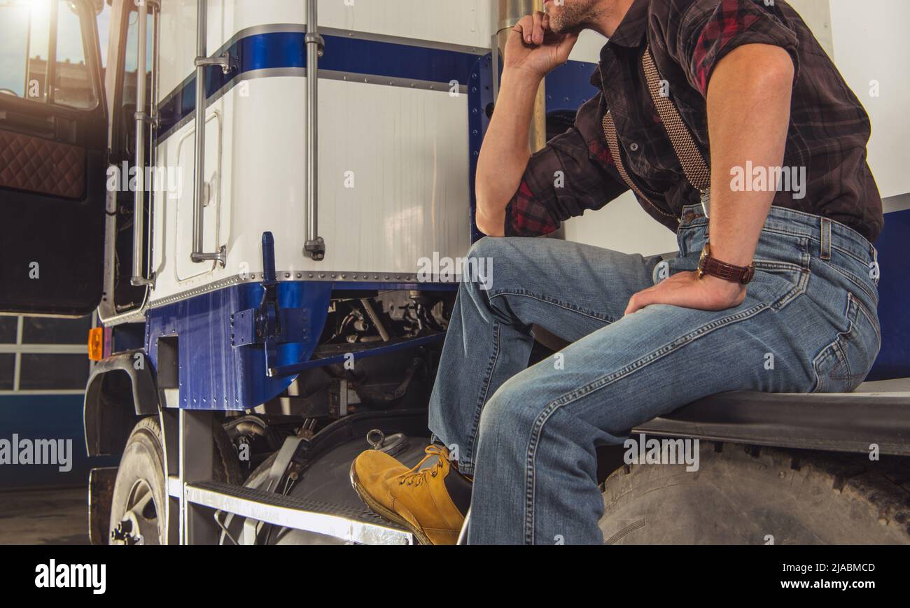 Caucasian Semi Truck Driver in His 40s Waiting For His Trailer to be ...