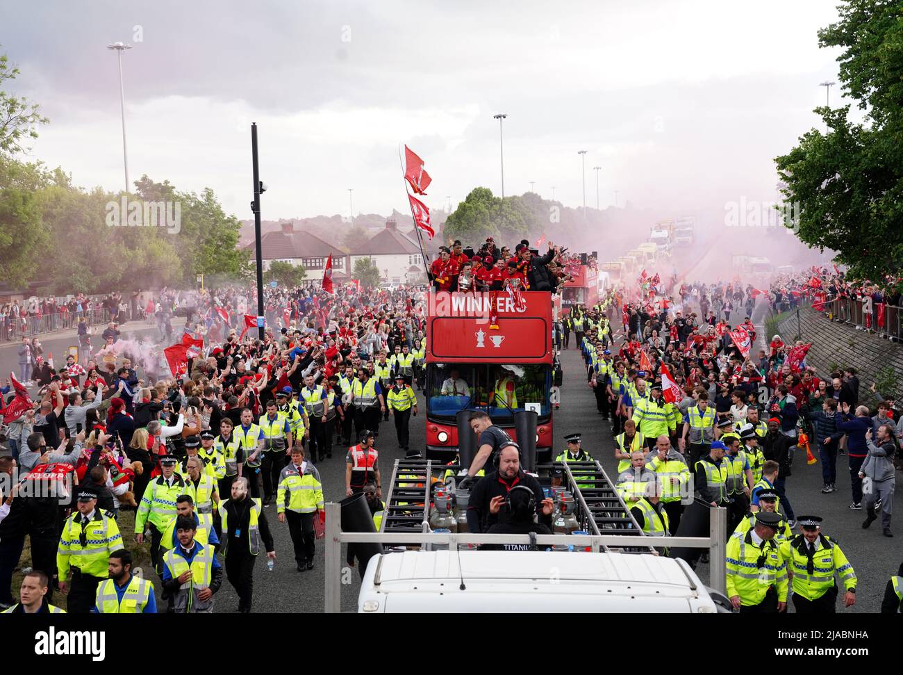 Liverpool players on an open-top bus during the trophy parade in ...