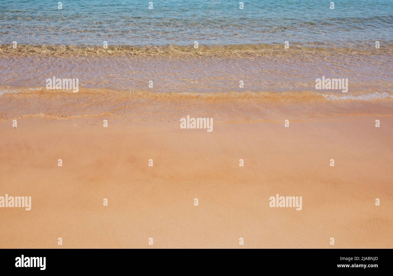 Beach background. Calm beautiful ocean wave on sandy beach. Sea view ...