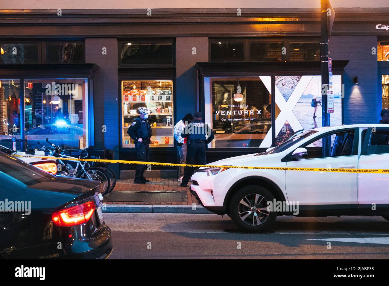 police at the scene of an attempted armed robbery where balaclava-clad ...
