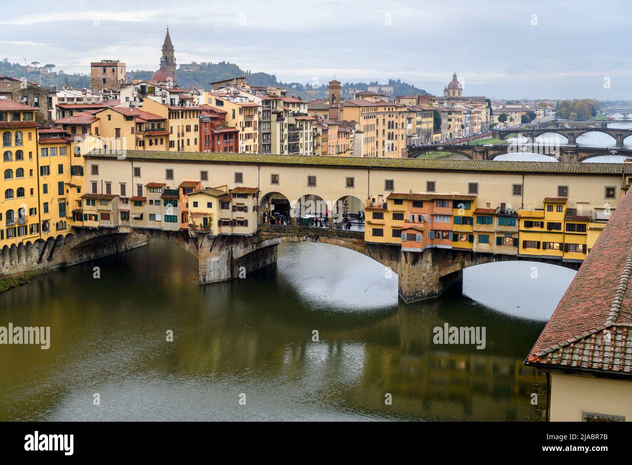 The Ponte Vecchio is a famous medieval bridge in Florence, built in ...