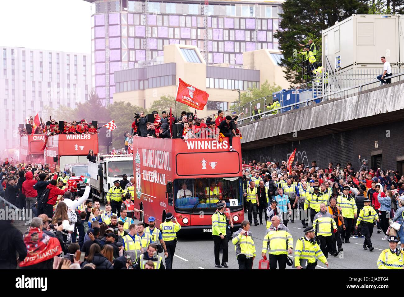 Liverpool players on an open-top bus during the trophy parade in ...