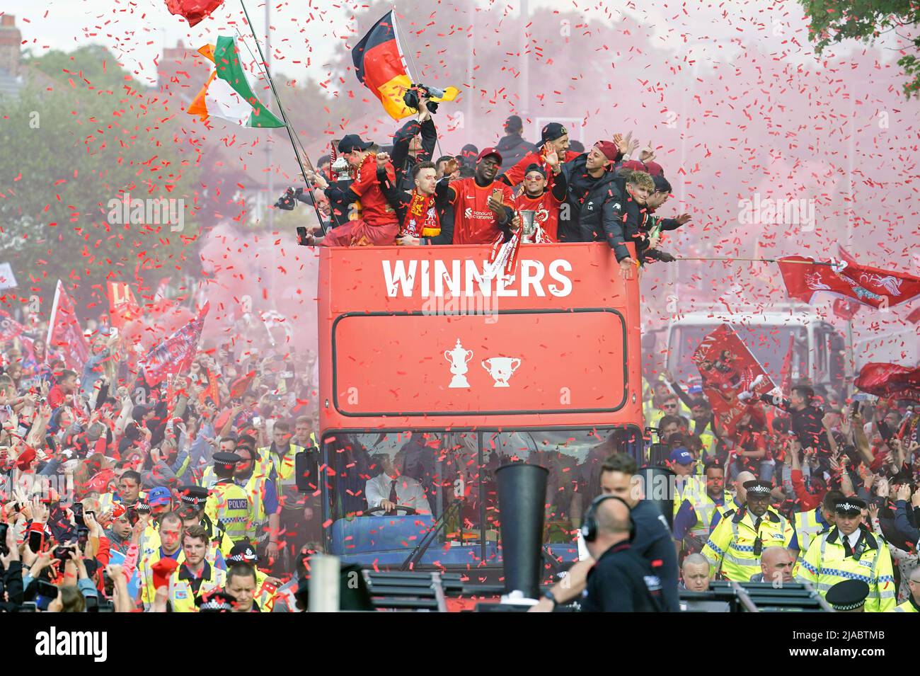 Liverpool players on an open-top bus during the trophy parade in ...