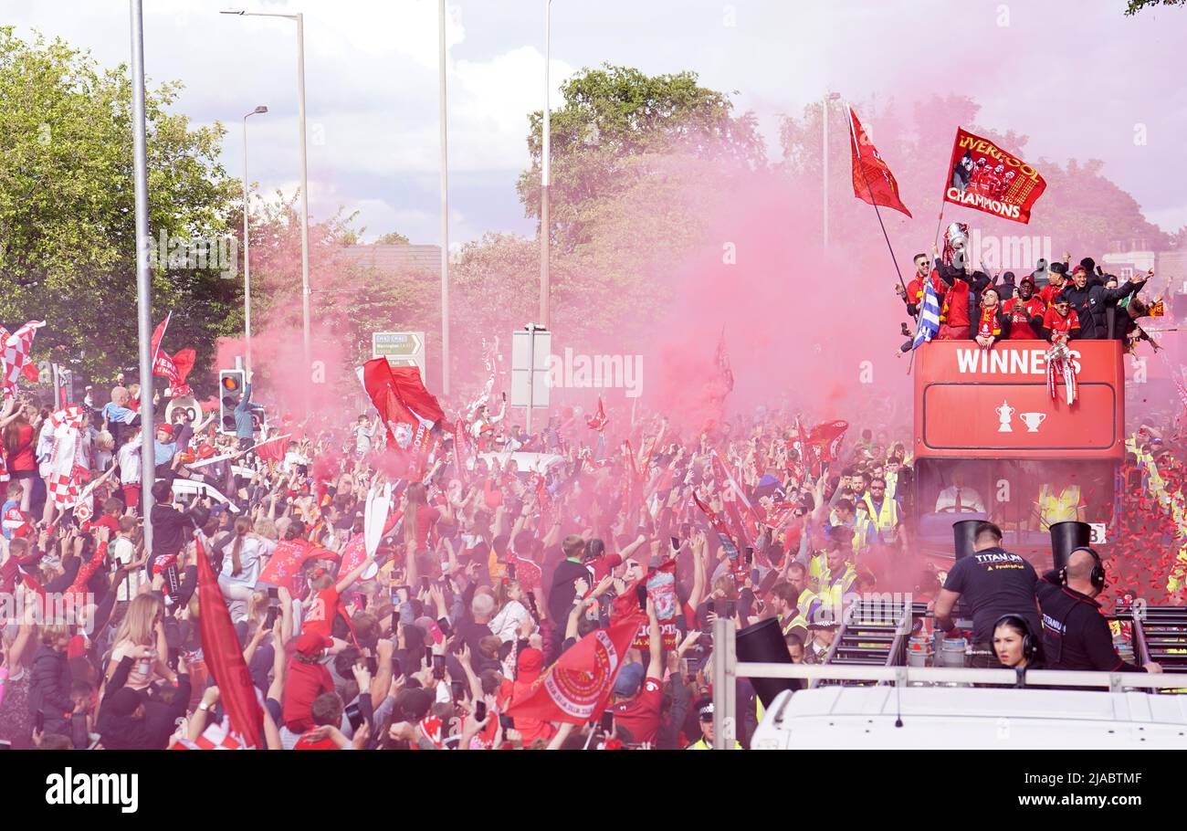 Liverpool players on an open-top bus during the trophy parade in ...