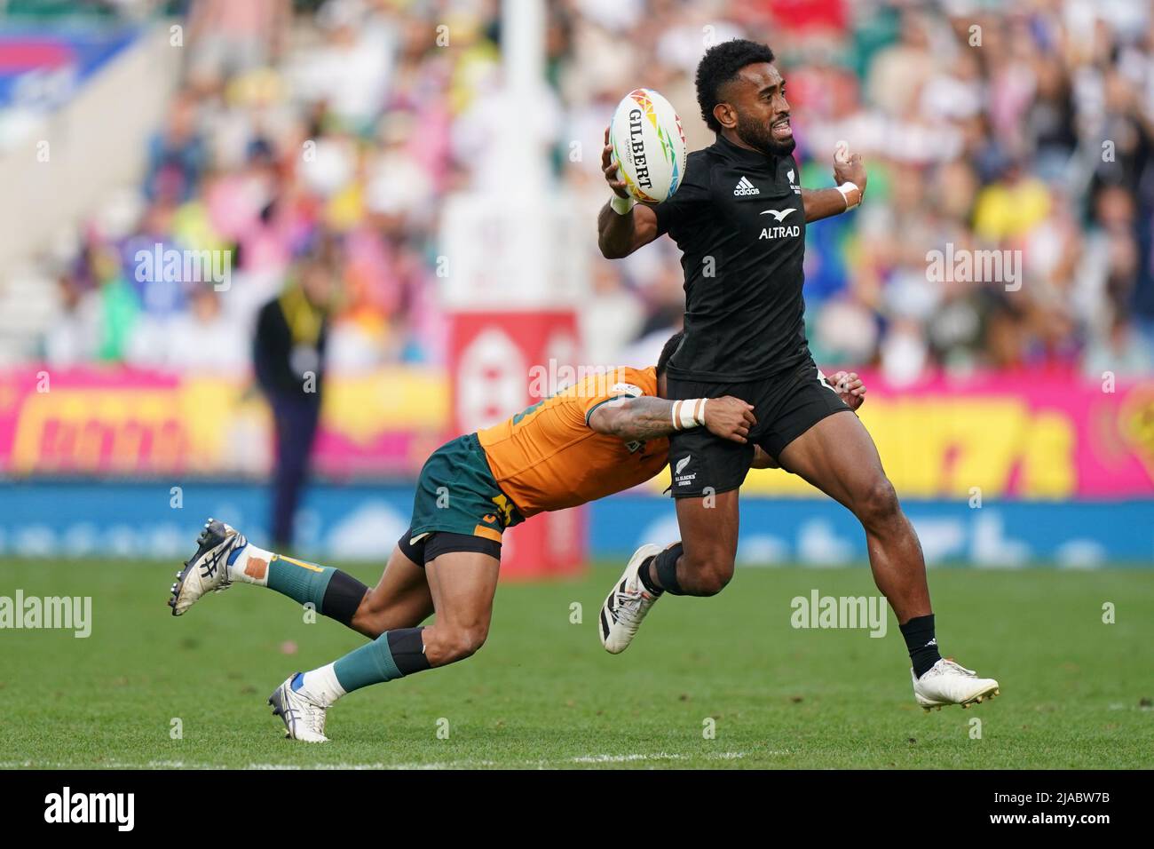 New Zealand's Akuila Rokolisoa (right) during the Cup Final on day two ...